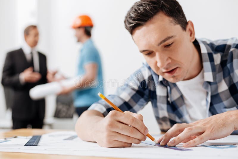 Diligent Architect Drawing a Line on a Blueprint Stock Image - Image of ...