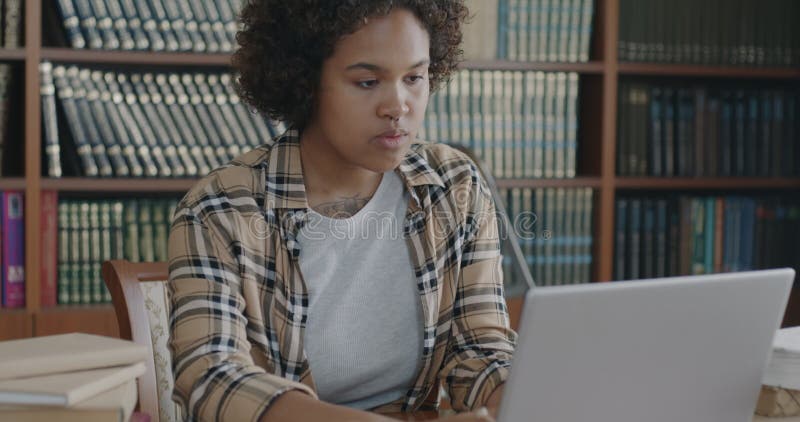 Diligent Female Student Concentrated on Self Education Using Laptop ...