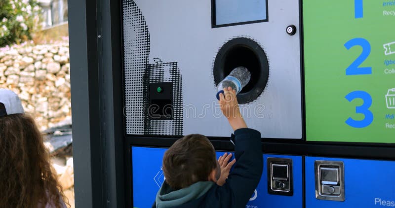 Diligent Little Kid Throws Plastic Bottles into Reverse Vending Machine ...