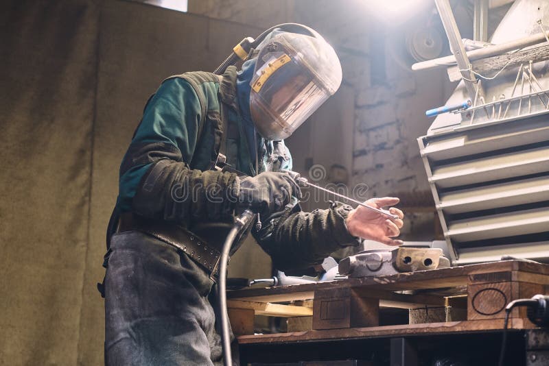 Diligent Man Is Working With Metal At Workshop Stock Photo - Image of ...