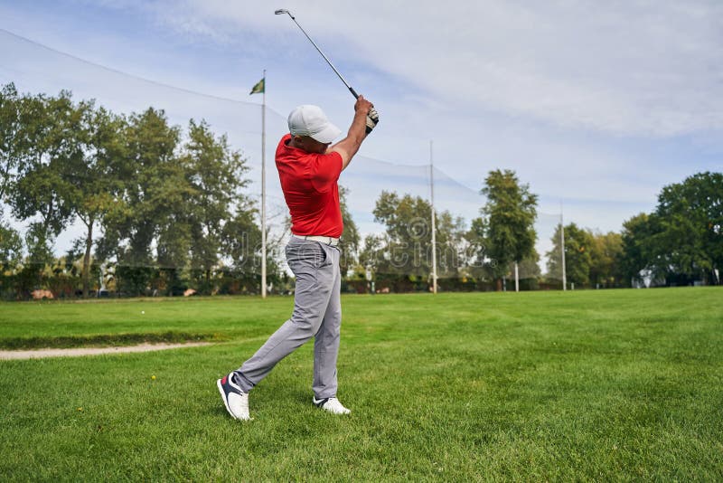 Serious Male Athlete Practicing His Golf Swings Stock Image - Image of ...