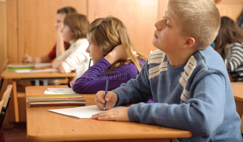 Diligent pupils stock image. Image of student, pencil - 13494067