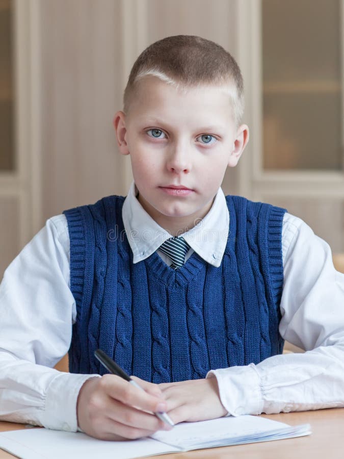 Diligent Student Sitting at Desk, Classroom Stock Image - Image of ...