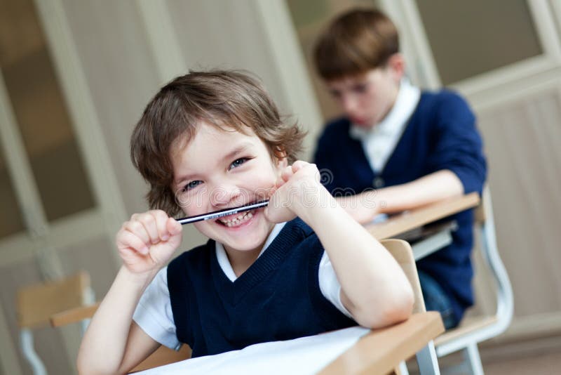 Diligent Student Sitting at Desk, Classroom Stock Image - Image of ...