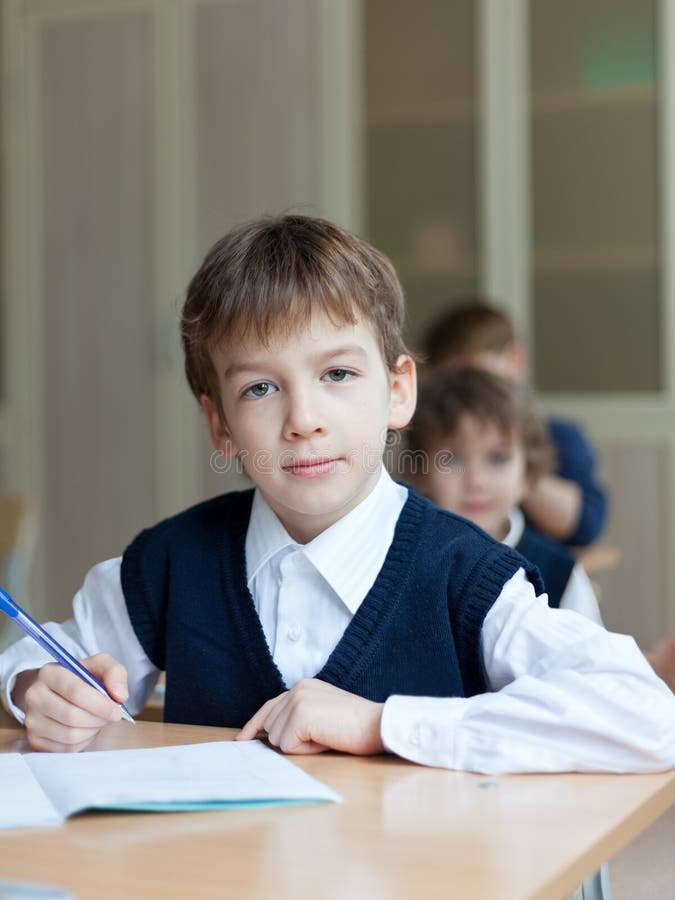 Diligent Student Sitting at Desk, Classroom Stock Photo - Image of ...