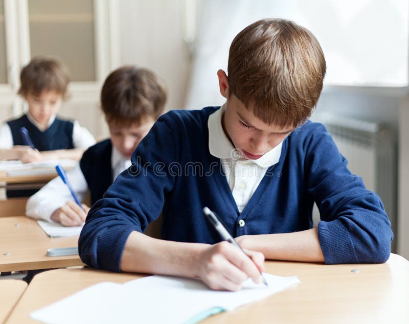 Diligent Student Sitting at Desk, Classroom Stock Photo - Image of ...