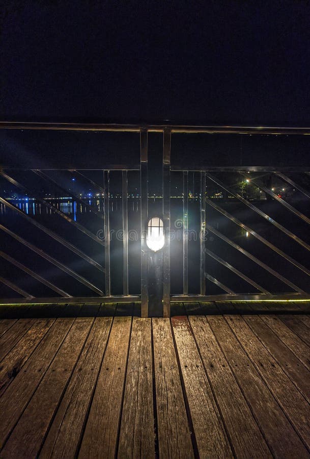 A Dim Light in the Park at Night Stock Image - Image of middle, light ...