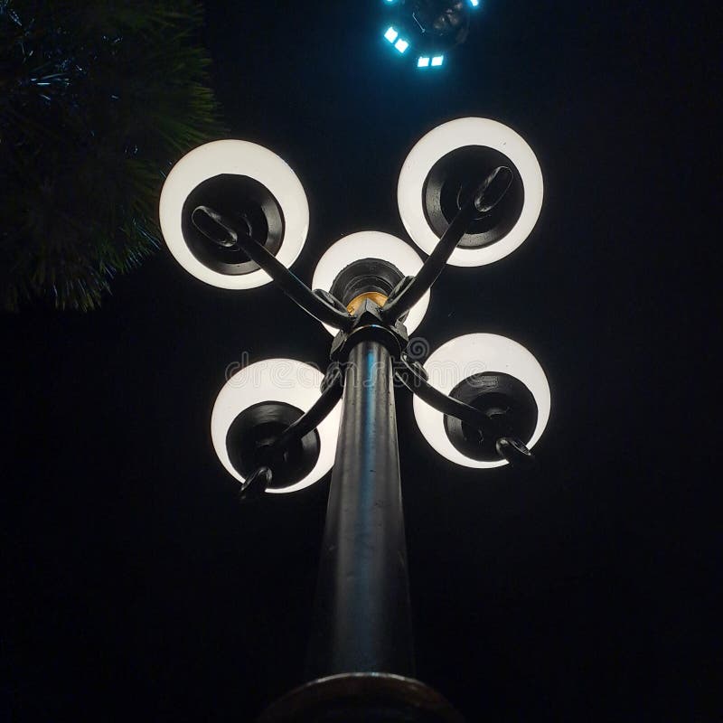 Dim street lights stock photo. Image of night, street - 276665374