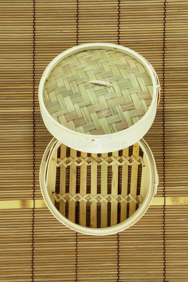 Dim-sum basket on mat stock image. Image of white, construction - 42063571