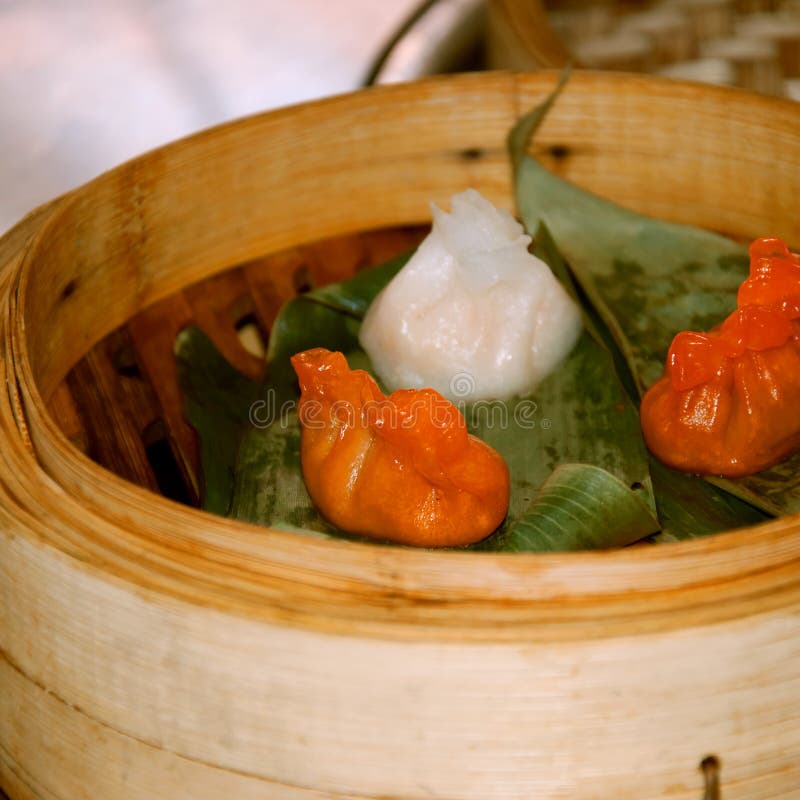 Dim Sum Cooked in Steamer Baskets. Stock Photo - Image of steamer ...