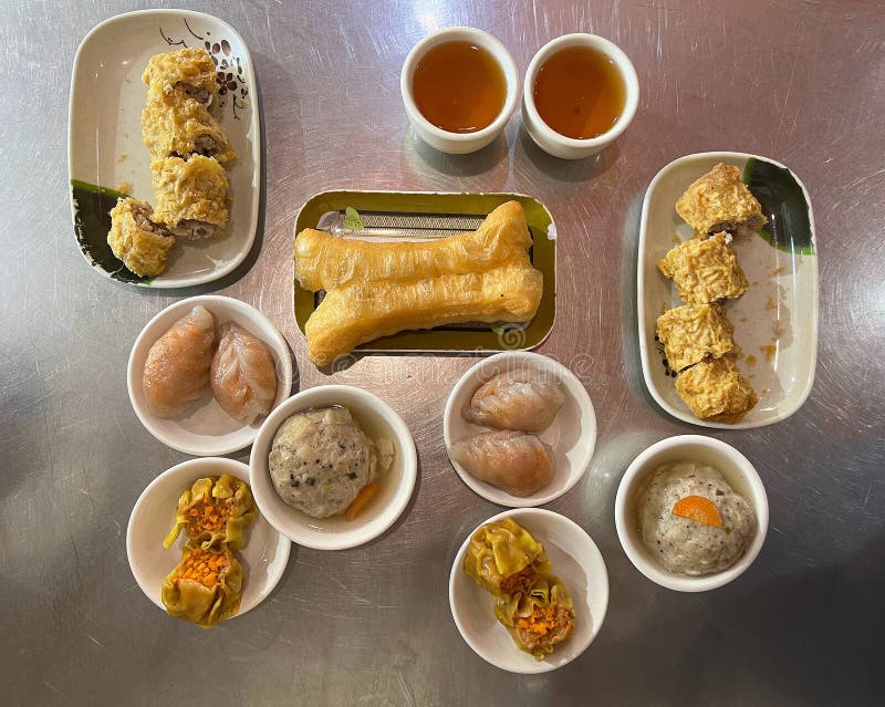 Dim Sum Delight with Tea stock photo. Image of hungry - 328496798