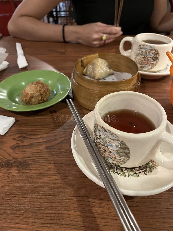 Dim Sum Delight Traditional Table Setting with Dumplings and Tea Stock ...