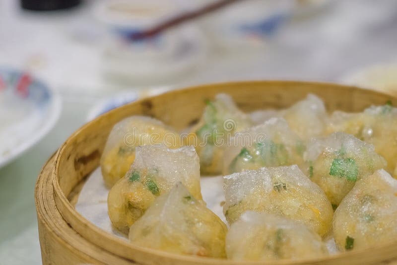 Dim sum on steamer baskets stock photo. Image of steam - 101992274
