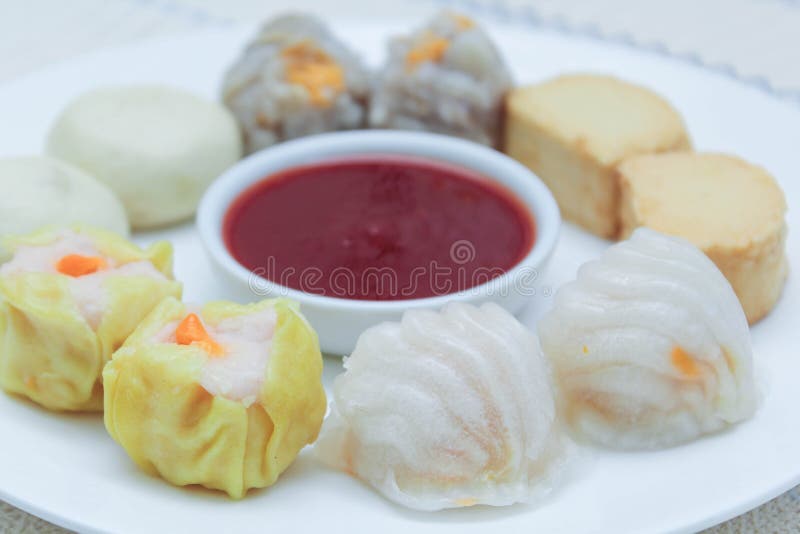 Dim sum in white plate stock image. Image of cuisine - 76930513