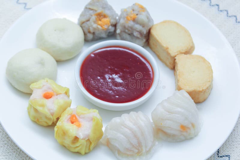 Dim sum in white plate stock image. Image of basket, dish - 76930519