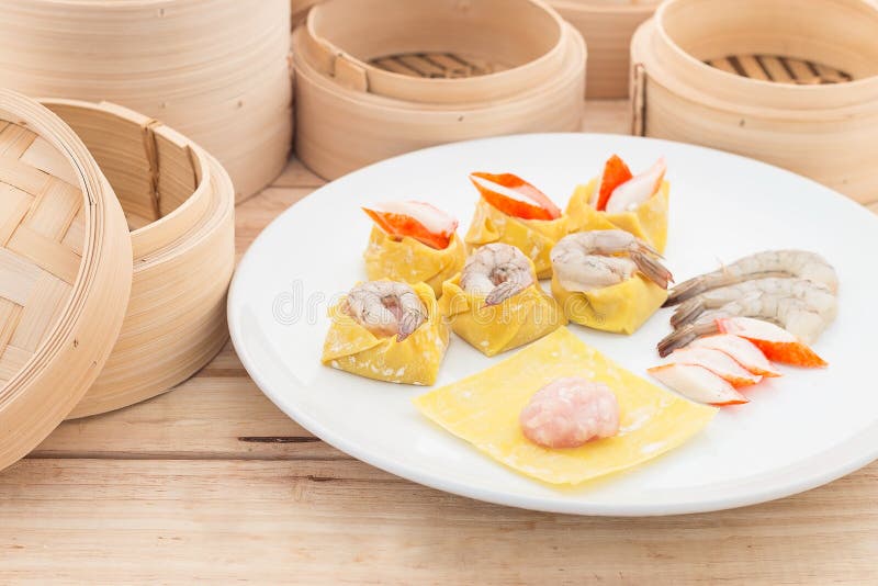 Dim sum in white plate stock image. Image of basket, dish - 76930519