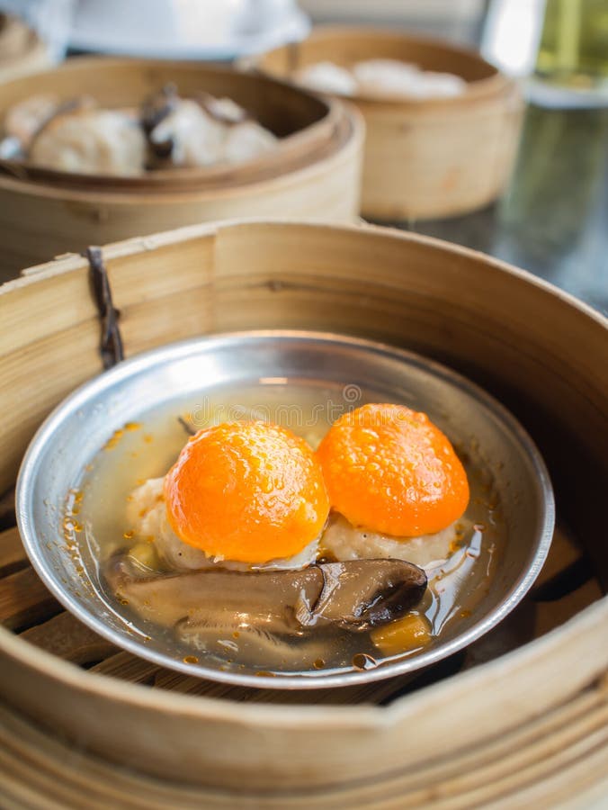 Dim Sum, York Egg on Pork Dumpling in the Basket Stock Photo - Image of ...