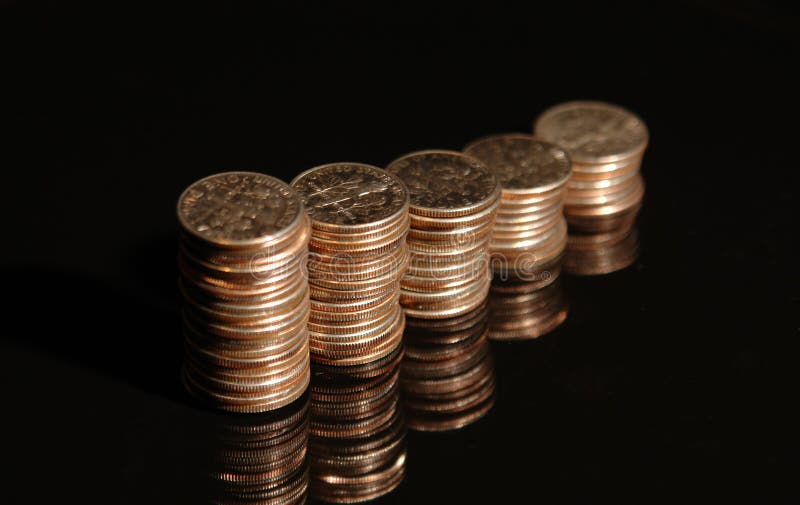 Stacks of Dimes on a Black Background Stock Image - Image of wealth ...