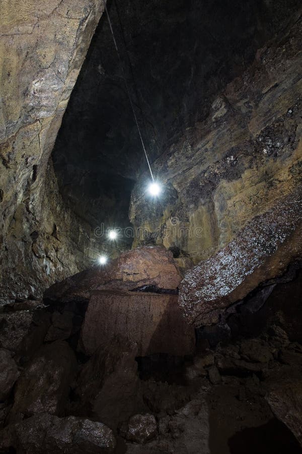Dimly Lit Cave with Natural Rock Formations Highlighting Underground ...