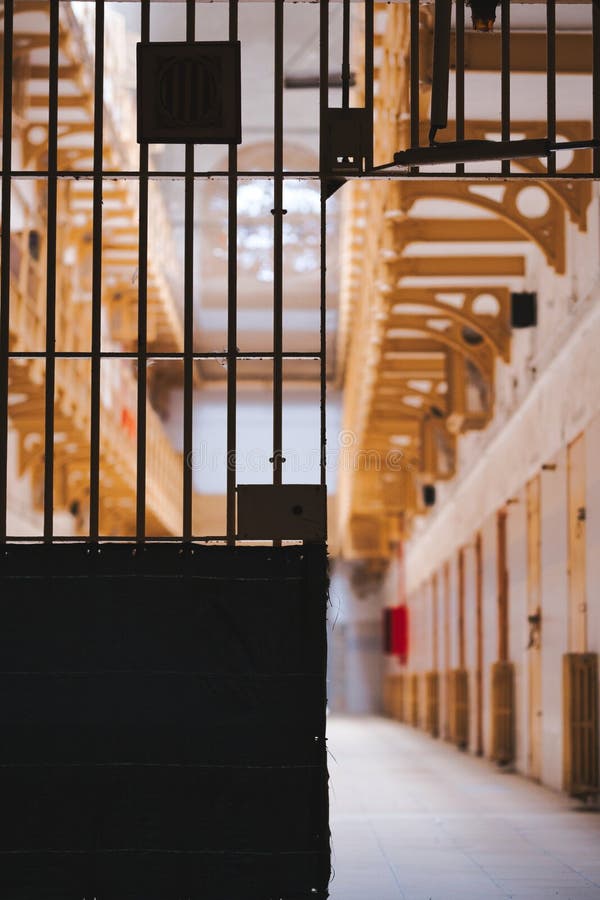Prison Corridor Behind Bars with Metal Gate Stock Image - Image of ...