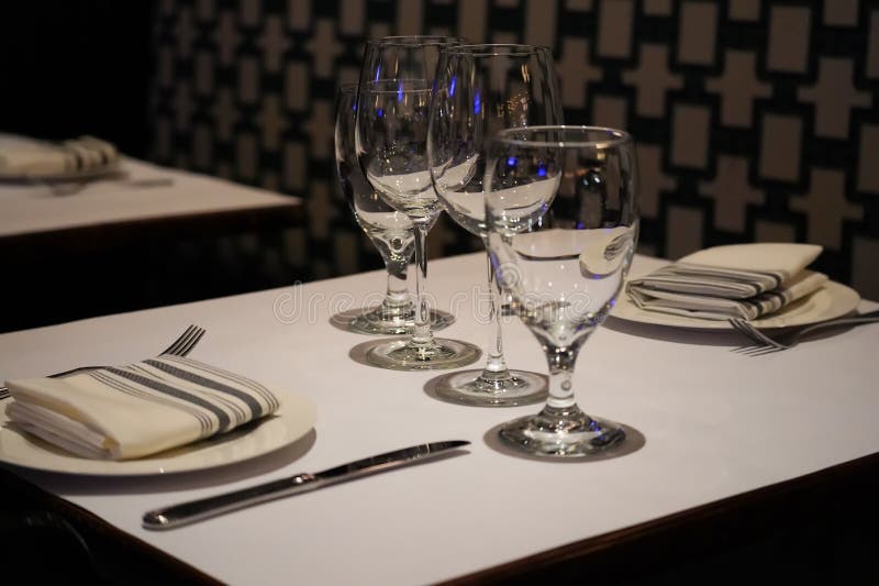 Restaurant Table Place Setting for Two with Wine Glasses Stock Photo ...