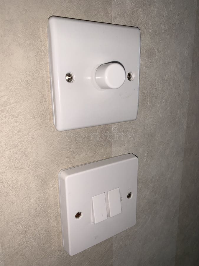 Dimmer Switch and Double Light Switch Taken at an Angle Stock Image ...