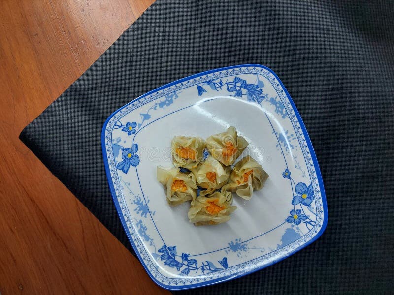 Dimsum on a Plate with Flower Decoration Stock Image - Image of food ...
