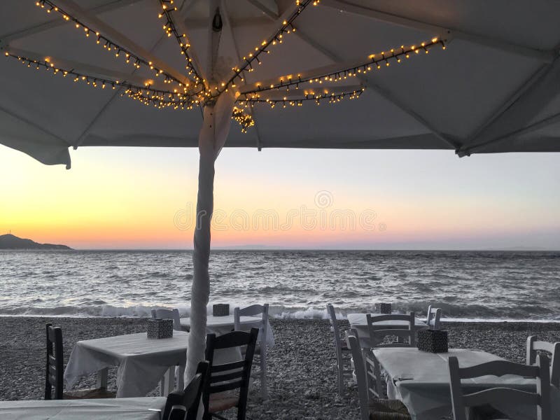 Diner on the Beach during Sunset. Stock Photo - Image of horizon ...