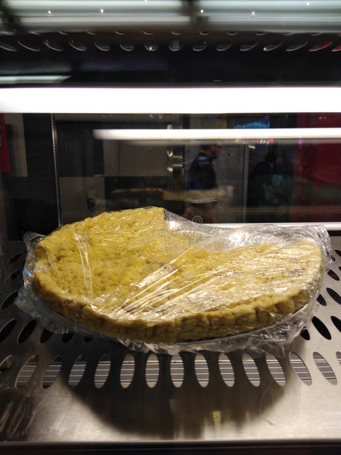 Diner Pie Wrapped in Plastic Wrap Stock Image - Image of diet, steel ...