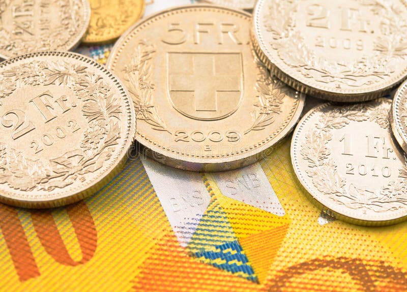 Monedas Suizas De La Plata Y De Oro Foto de archivo - Imagen de lingote ...