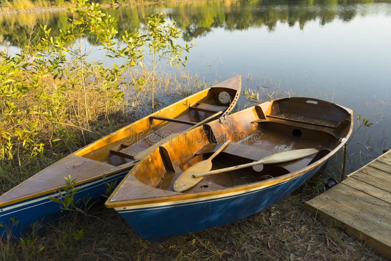 Dinghy Paddle Boat on Clear Water. Oar Stock Photo - Image of ...