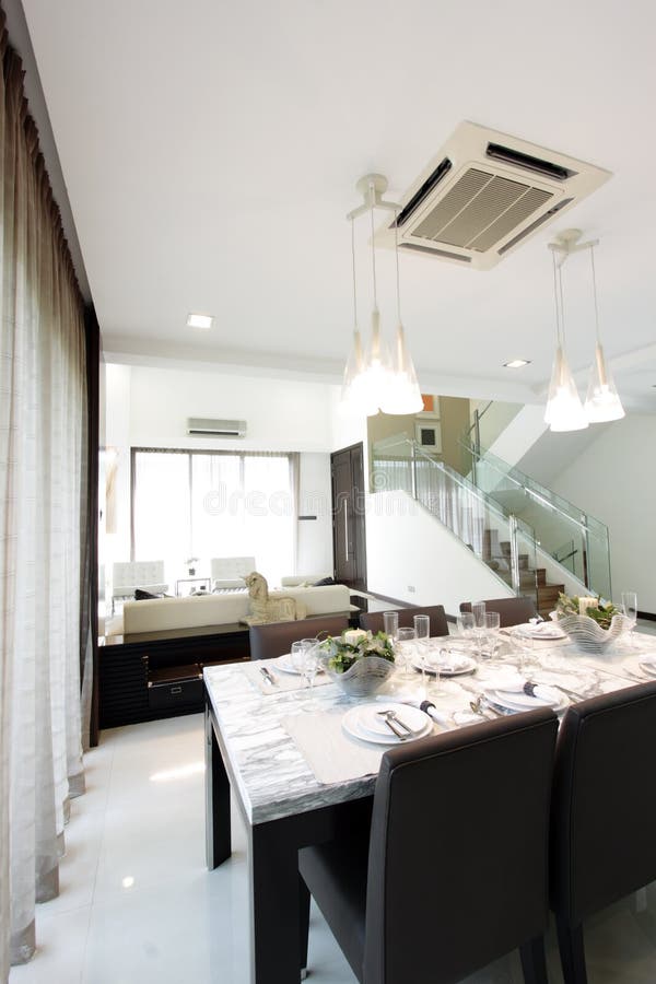 Dining Area Overlooking Living Room Stock Image - Image of chairs ...
