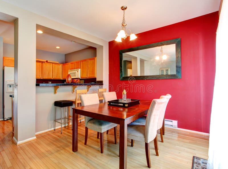 Dining Room with Contrast Red Wall Stock Image - Image of estate ...