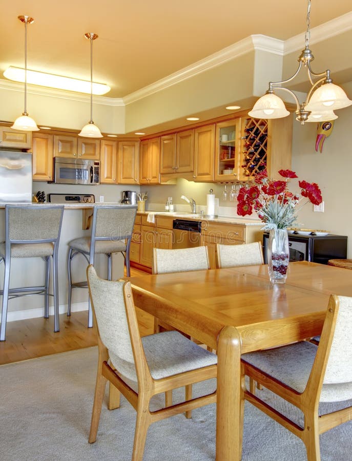 Dining Room Near Luxury Kitchen in Apartment. Stock Photo - Image of ...