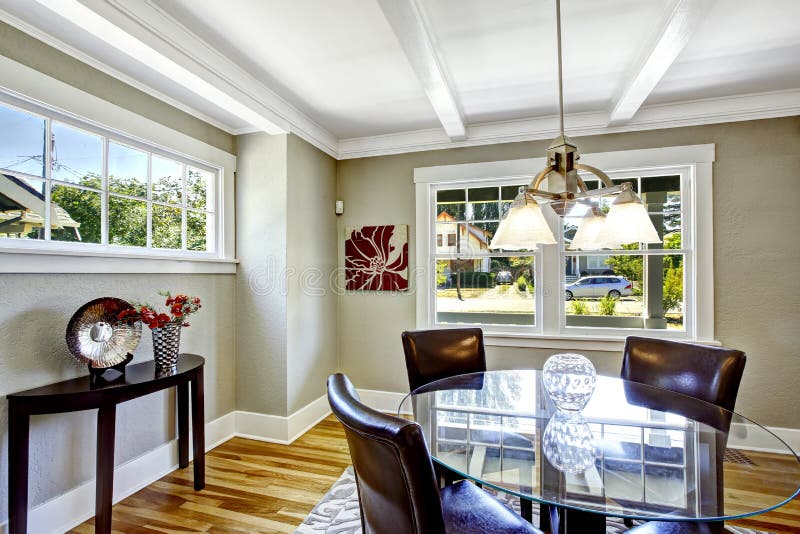 Dining Set. Glass Round Top Table with Leather Chairs Stock Photo ...