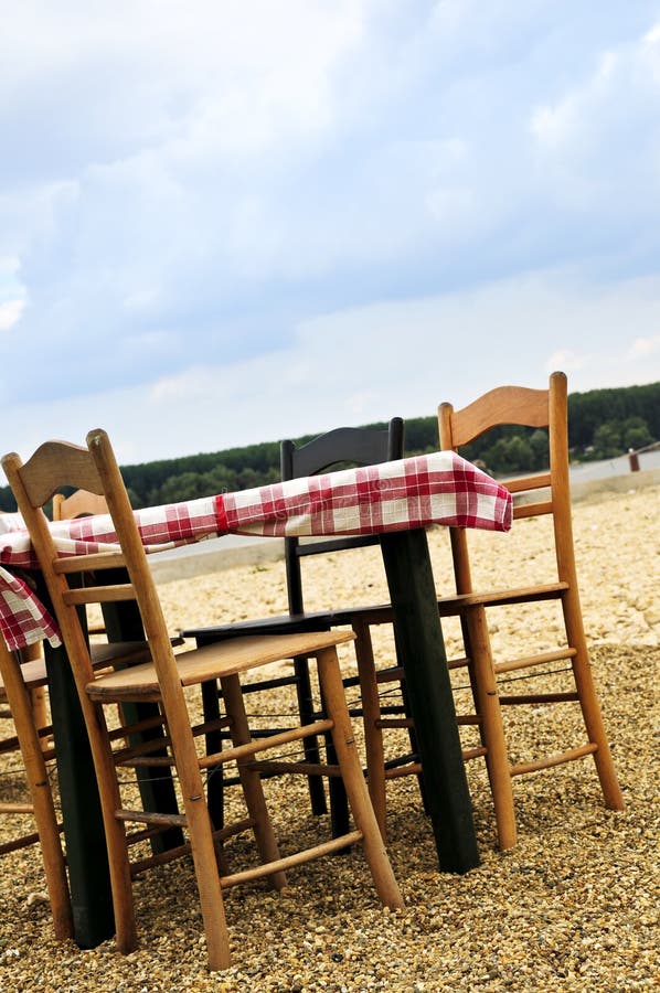Dining table in a beach stock photo. Image of wooden, table - 7199888