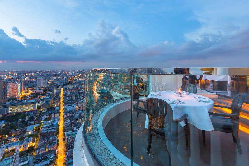 Dining Table with Beautiful City View at Twilight Scene Stock Photo ...