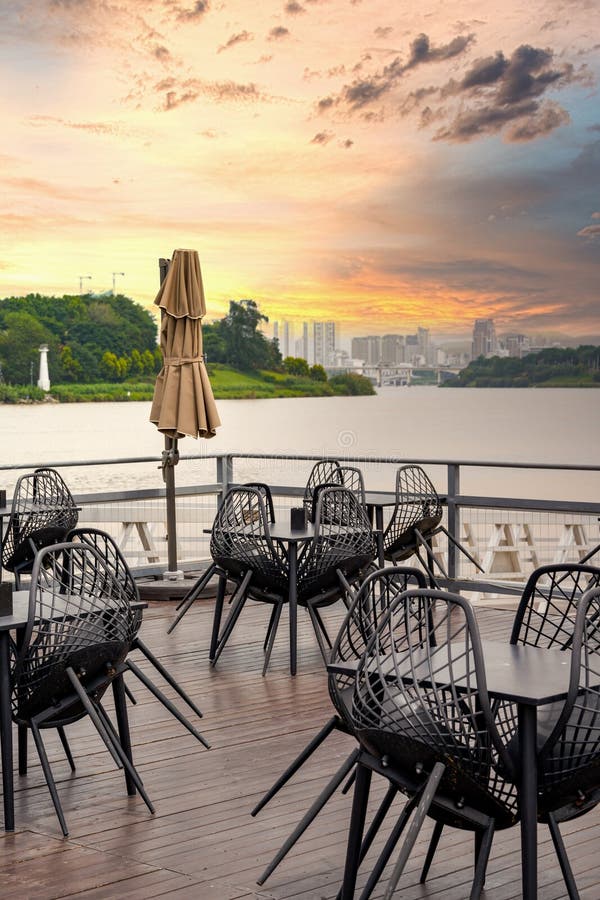Dining Table and Chairs in a Leisure Cafe by the River Stock Photo - Image of room, tropical ...