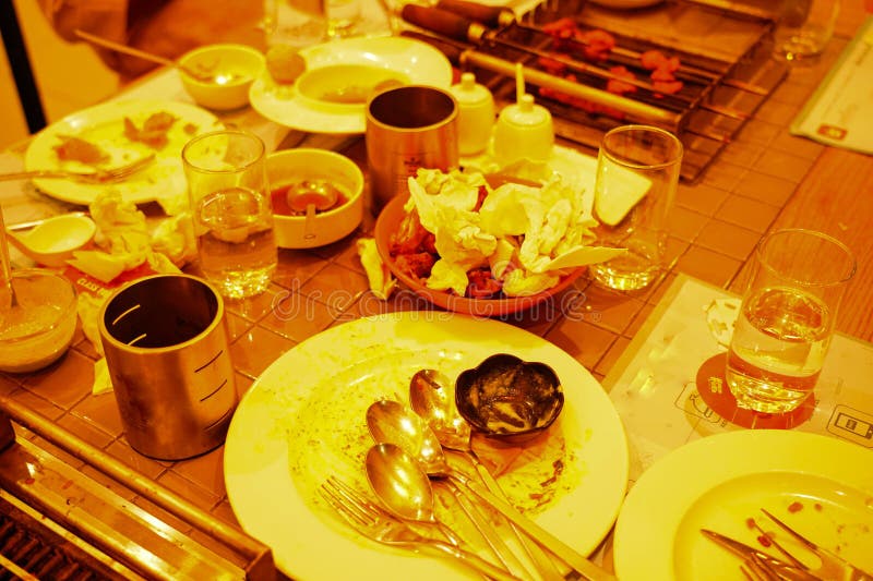 A Dining Table after a Dinner in Warm Light Stock Photo - Image of ...