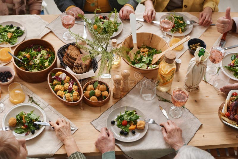 Dining table with food stock photo. Image of salad, alcohol - 216162988