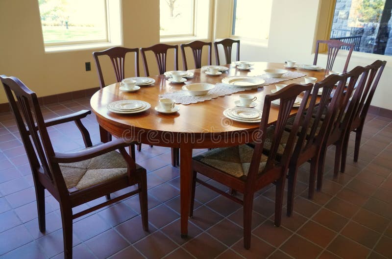 A Dining Table with Glassware Overlooking a Bright Window Stock Image ...