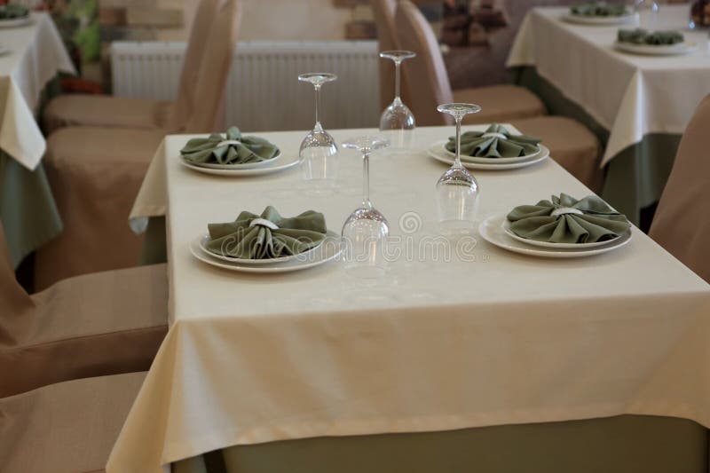 Dining table with plates stock photo. Image of dining - 96836934