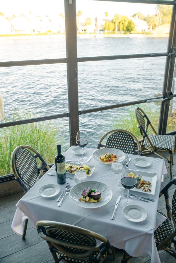 Dining Table in the Restaurant Overlooking the Lake Editorial Stock ...
