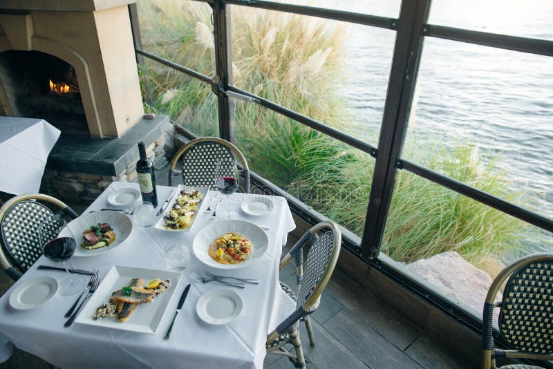 Dining Table in the Restaurant Overlooking the Lake Editorial Photo ...