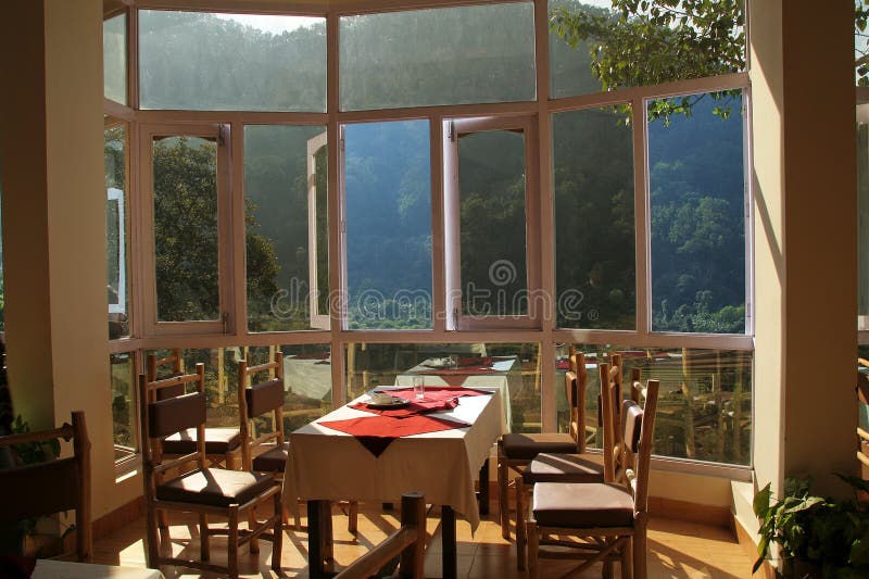 Dining Table of the Restaurant with a Window View on the Nature ...