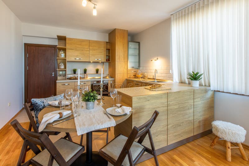 Dining Table with Table Set in Modern Dining Room Interior Design ...