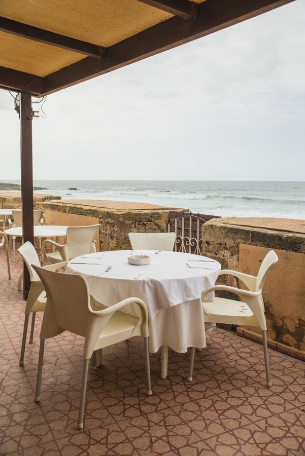 Dining Table on the Terrace Near the Beach in Rabat Stock Photo - Image ...