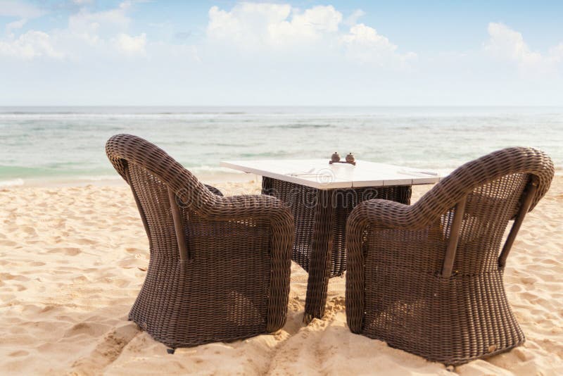 Dining Table and Two Chairs by Sea Side Stock Image - Image of climate ...
