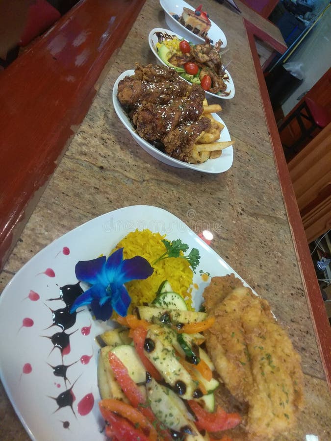 Dinner at the bar stock photo. Image of served, restaurant - 113143410