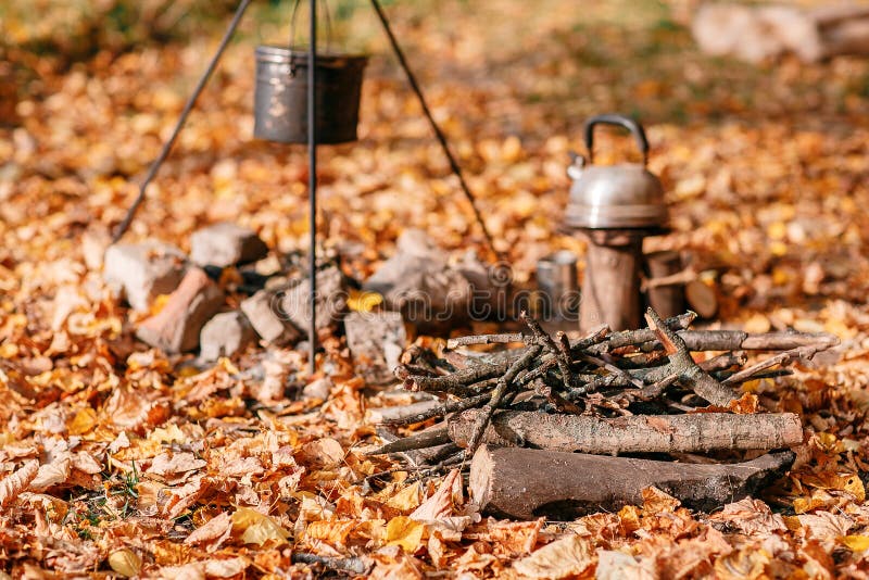 Dinner Cooks in a Large Pot Over an Open Fire. Autumn Forest Stock ...